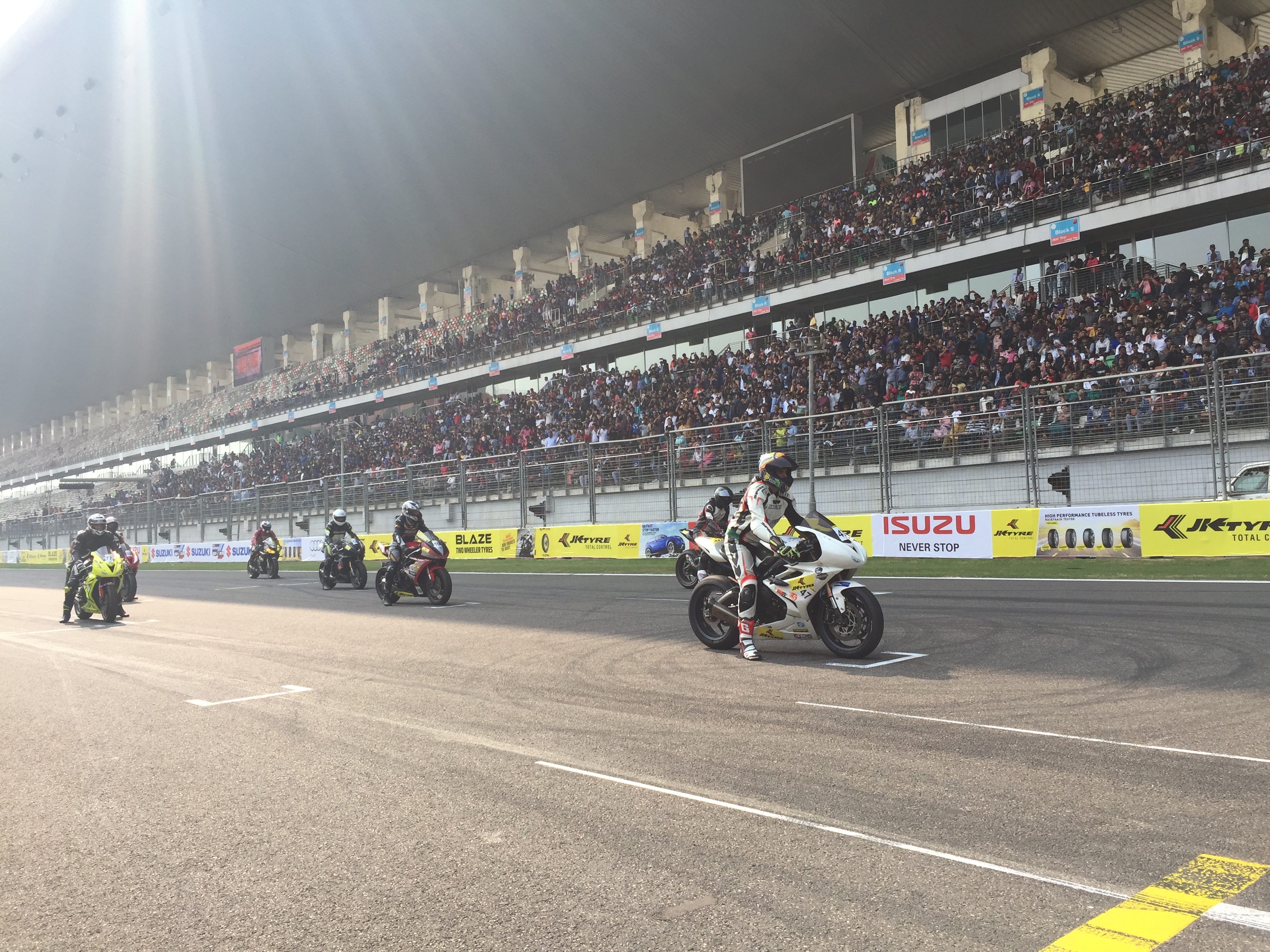 Triumph Motorcycles races to the finish at the JK Tyre Racing ...